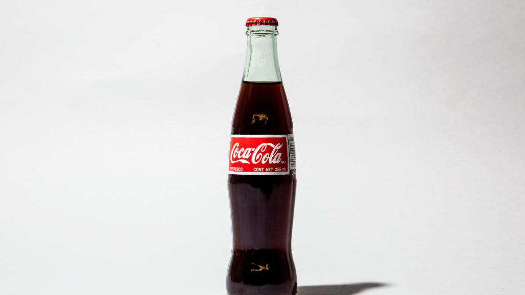 From Grocery Shelves To Pop Culture: A Century of Coca-Cola Bottles | WAMU