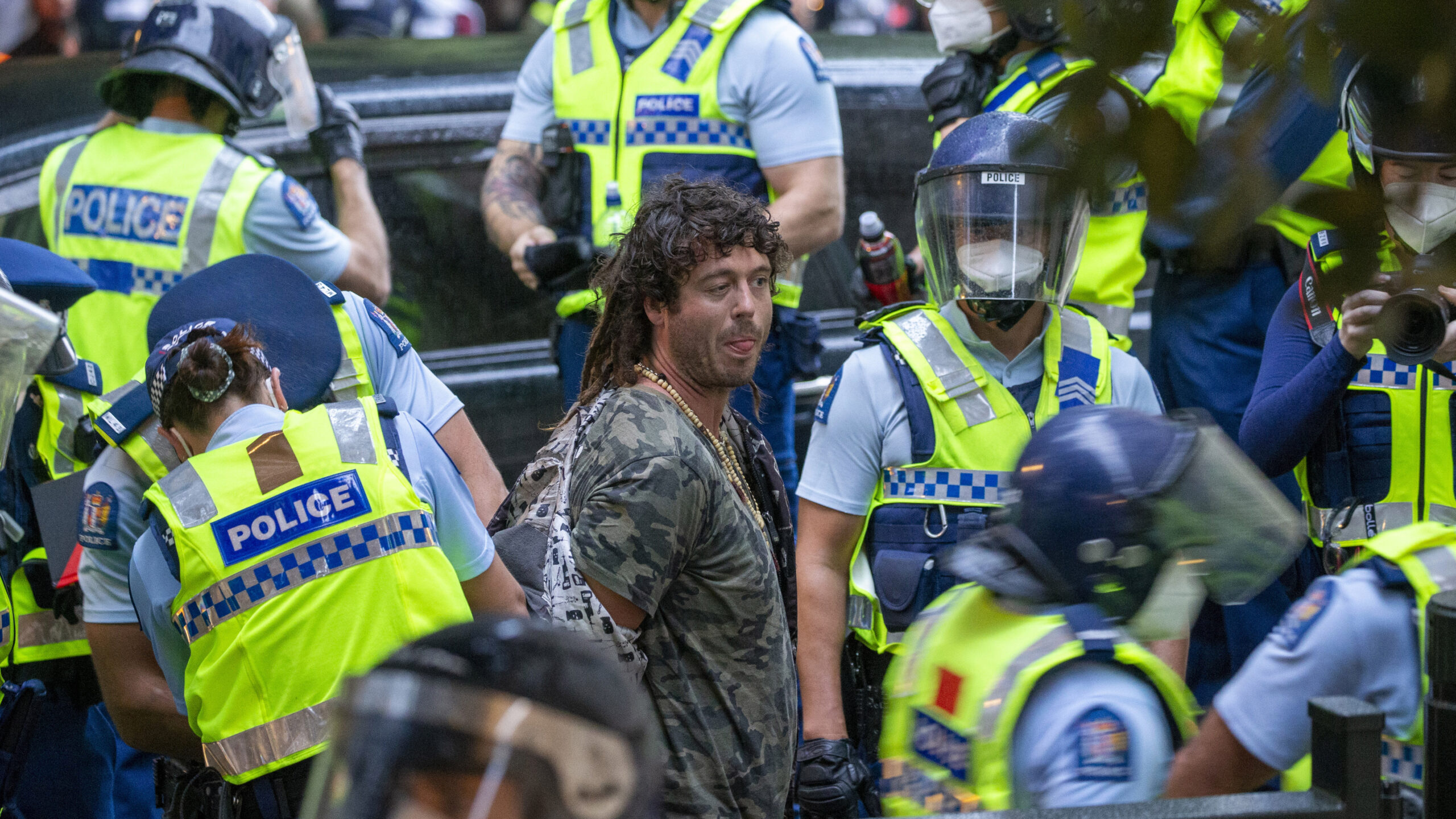 New Zealand protesters set fires as police break up camp | WAMU