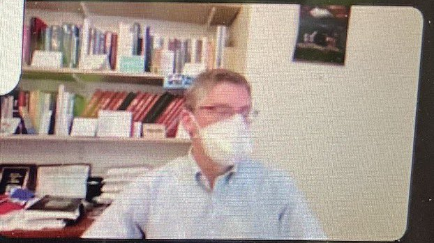 This photo of a professor wearing a mask went viral. So did his ...
