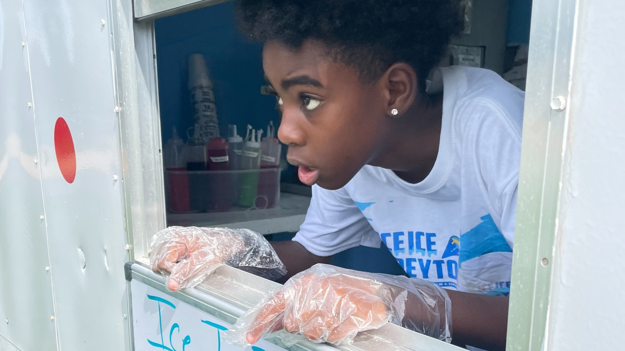A 12-year-old boy is learning about business, and life, slinging snow ...