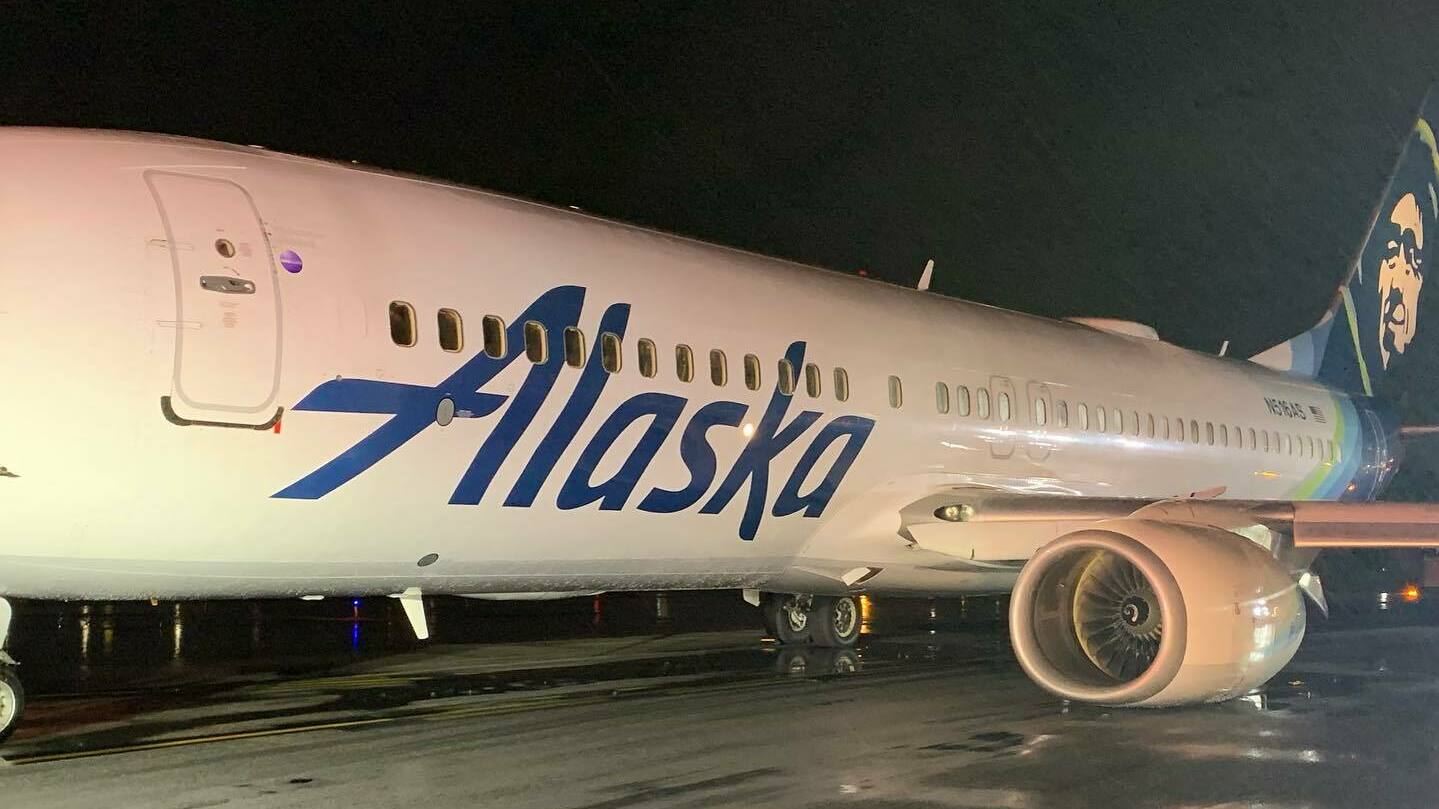 Alaska Airlines flight makes hard landing during California storms | WAMU