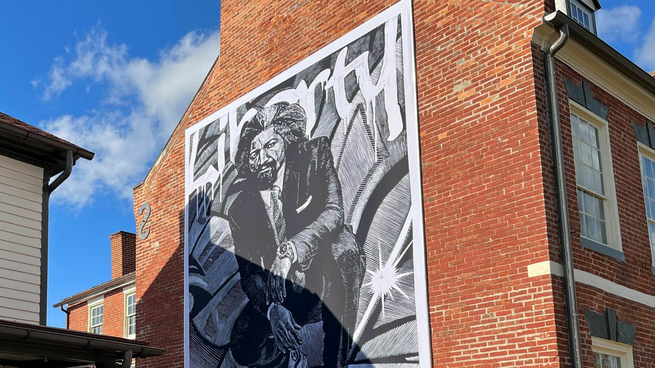 A Frederick Douglass mural in his hometown in Maryland draws some ...